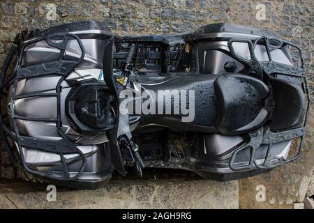 Close-up ATV 4wd quad bike in forest at winter. 4wd all-terreain ...