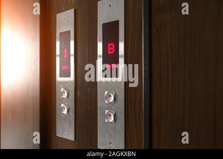 Closeup elevator button panel focus on LED display. The elevator door ...