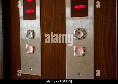 Closeup elevator button panel focus on LED display. The elevator door ...