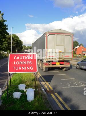 Road sign: caution lorries turning Stock Photo - Alamy
