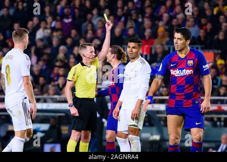 BARCELONA - DEC 1: The referee shows a yellow card to Victor Sanchez at ...