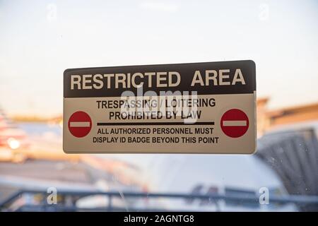 airport security restricted area sign england uk Stock Photo - Alamy