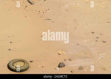 A small section of riverbed is shown at the side of the River Thames ...
