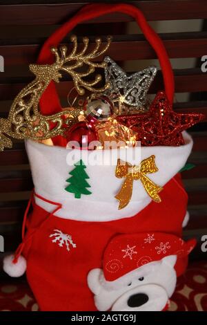 Santa clause Christmas gift bag Stock Photo - Alamy
