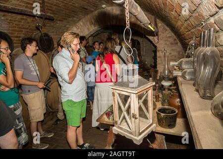 Using audio guide in the Labyrinth underground tunnels, Brno, Czech ...