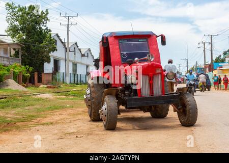 Trinidad, Cuba - June 6, 2019: Farming Tractor riding in the streets of ...