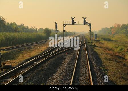 railway tracks. one point perspective view of a strait long train rail ...