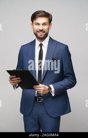 handsome man manager hold folder with documents isolated on white ...