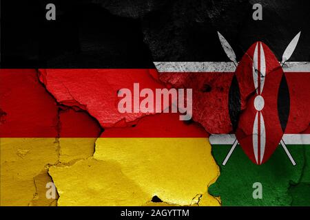 Kenyan flag with German flag on a tree stump isolated Stock Photo ...
