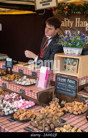 Christmas market stall selling fudge and toffee Stock Photo - Alamy