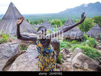 Lotuko tribe woman performing a welcome dance, Central Equatoria, Illeu ...
