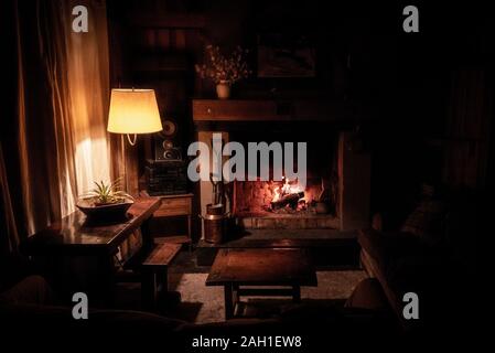 Living room and dining room with dimly lit lights Stock Photo - Alamy