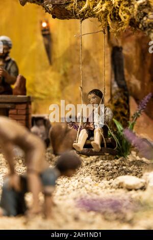 Nativity scene showing the village of Bethlehem with details from the ...