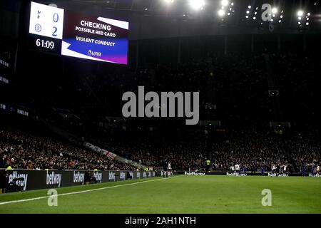 The big screen shows the VAR checking to confirm that Arsenal's Reiss ...