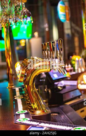 Serving draft beer in a fancy bar Stock Photo - Alamy