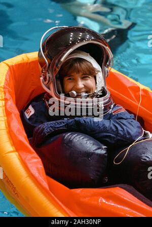 Astronaut Linda M. Godwin, STS-37 mission specialist, floats in a one ...