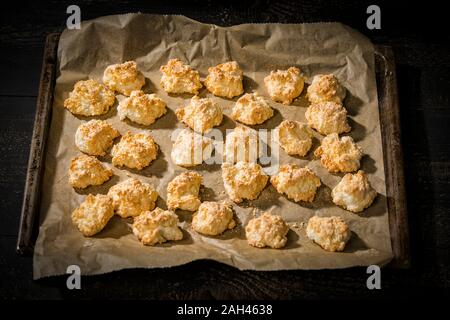 tray of freshly baked coconut macaroons on a stall in belfast northern ...