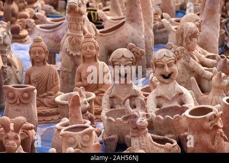 Figurines made of red clay Stock Photo - Alamy