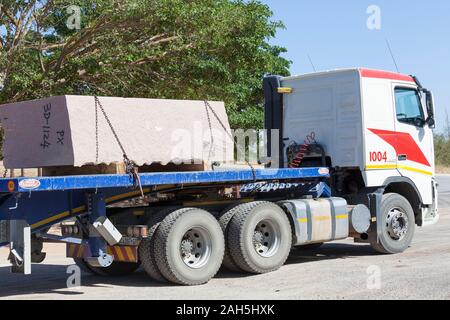 Mining vehicle transport. Mining vehicle being transported to a heavy ...