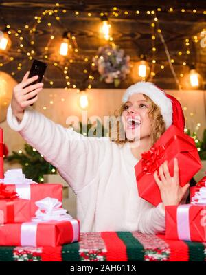 hello. christmas blogging. making selfie. happy woman hold phone. xmas ...