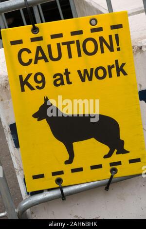 K9 at work sign Stock Photo - Alamy