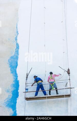 People of Havana Series - Two Cuban construction workers painting a ...