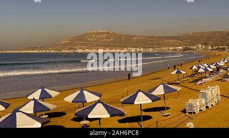 Sandy beach in travel AGADIR city in MOROCCO landscapes, clear blue sky ...
