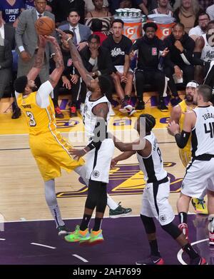 Los Angeles Lakers' Anthony Davis, right, talks with Dwight Howard ...