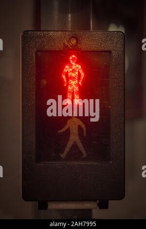 Red man symbol at a pedestrian crossing Stock Photo - Alamy