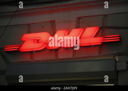 DHL Express (Dalsey Hillblom and Lynn) logo seen on a delivery vehicle ...
