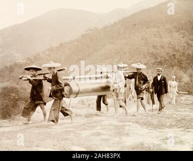 China, A group of mourners, including one paid mourner dressed in white ...