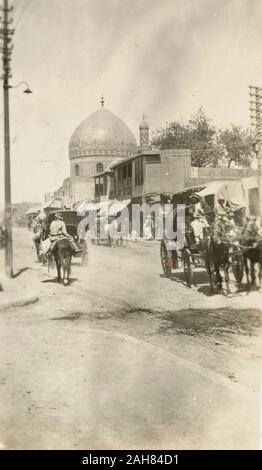 A street scene in Baghdad, Iraq, depicting daily life and urban ...