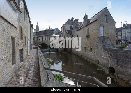 Bayeux, France - August 14, 2016: Water mill and Aure River in the old ...