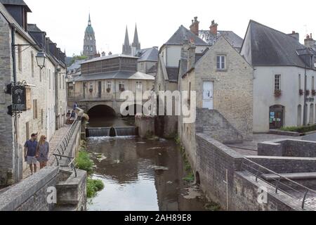 Bayeux, France - August 14, 2016: Water mill and Aure River in the old ...