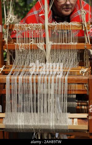 Woman weaves in the tradition of ancient Incas; Cuzco, Peru Stock Photo ...