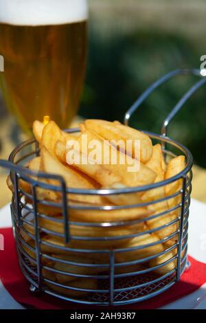 Belgian fried potatoes, traditional street food in Belgium served ...