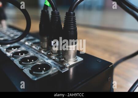Audio snake and stage box with xlr cables and jacks at a live event ...