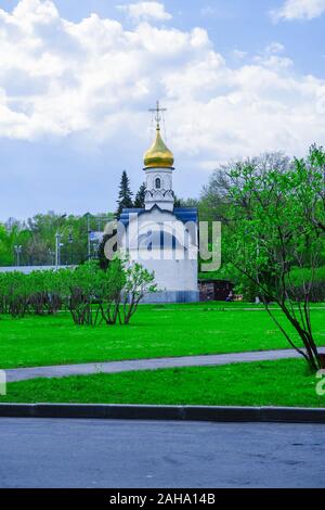 Orthodox white chapel in Moscow park in Russia background Stock Photo ...