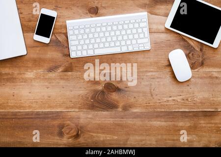 Top view of modern devices on red background ready for sale on Black ...