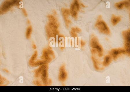 Piadina, italian tortilla texture background Stock Photo - Alamy