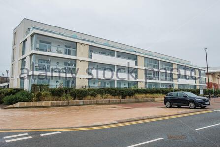 The seafront at New Brighton, Wallasey, UK with buildings reflected ...
