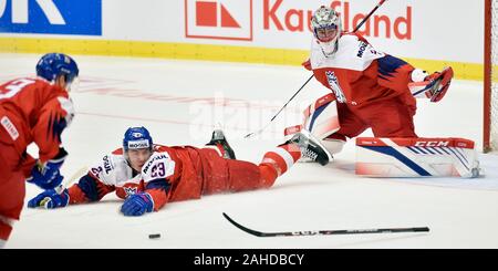 Czech hockey players U20 L-R Jakub Kos and Ales Cech present silver medal after the 2023 IIHF ...