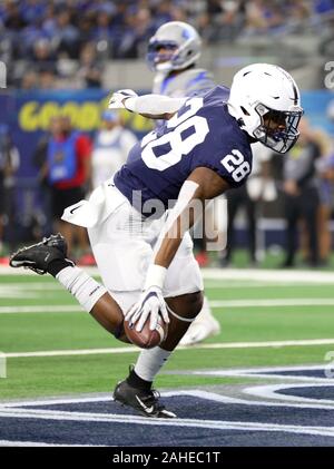 Penn State running back Devyn Ford (28) pushes off Maryland linebacker ...