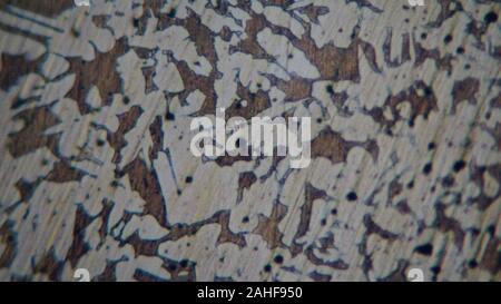 metallurgical micrograph of brass braze metal showing a peritectic ...