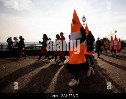 Darts fans arriving in fancy dress on day eighteen of the Paddy Power ...