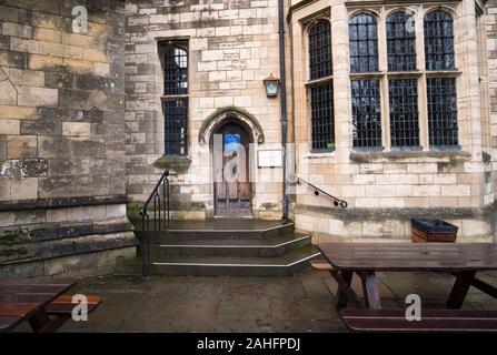 Refectory door and stone steps Stock Photo - Alamy