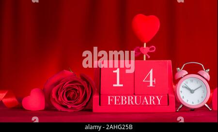 A number 7 on a pink wooden block isolated on blue background Stock ...