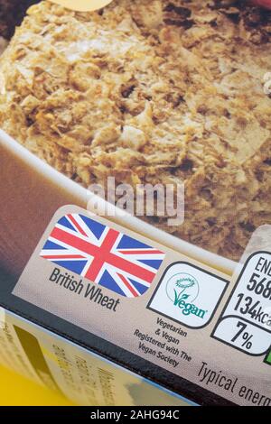 Close-up ASDA food labelling Vegetarian logo / veggie V sign. Food ...