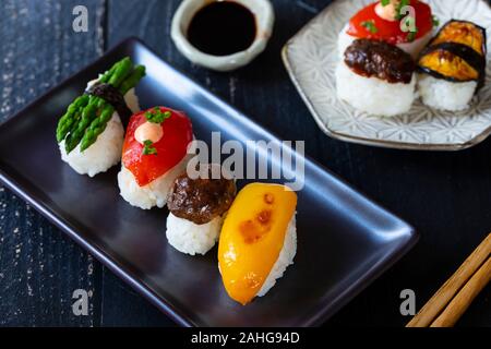Vegan sushi with tomato, mushroom and asparagus Stock Photo - Alamy