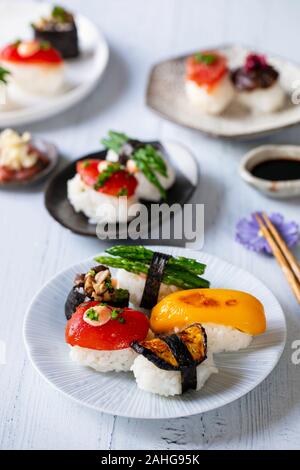 Vegan sushi with tomato, mushroom and aubergine Stock Photo - Alamy